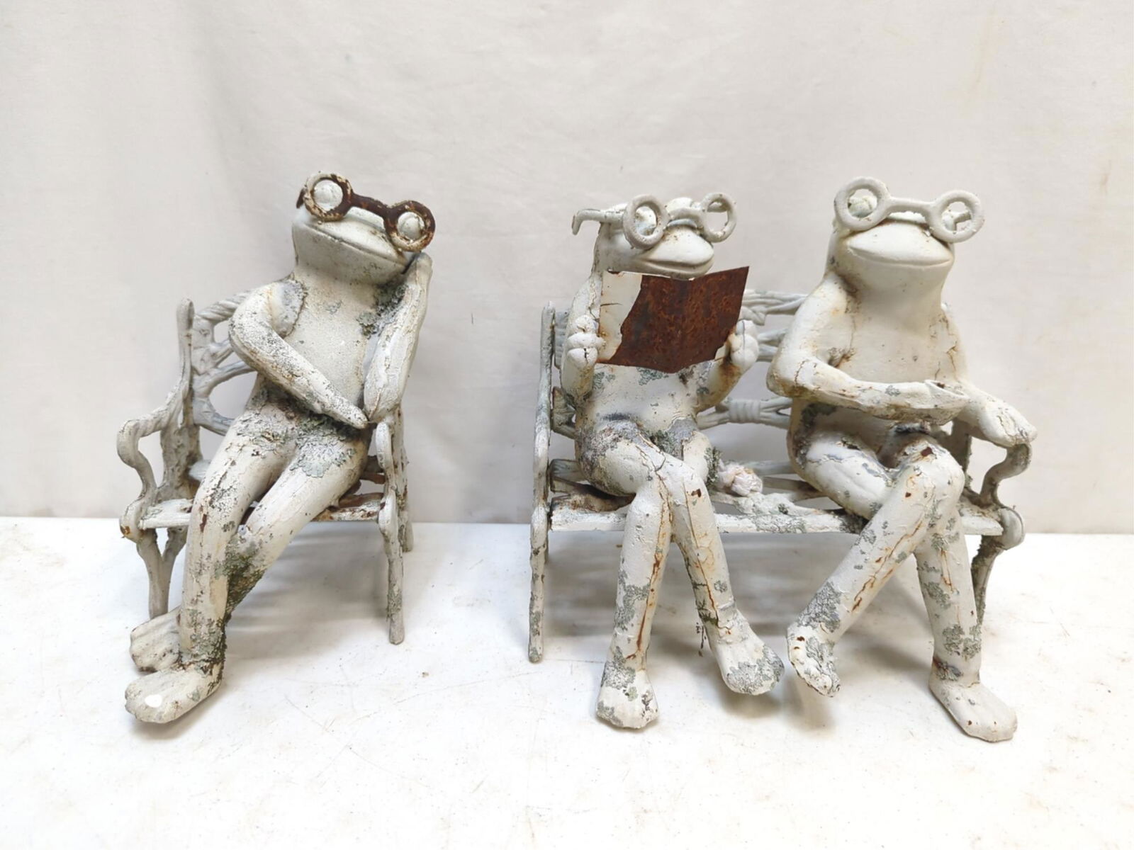 Vintage Cast Iron Frogs Se4ated On Cast Iron Bench