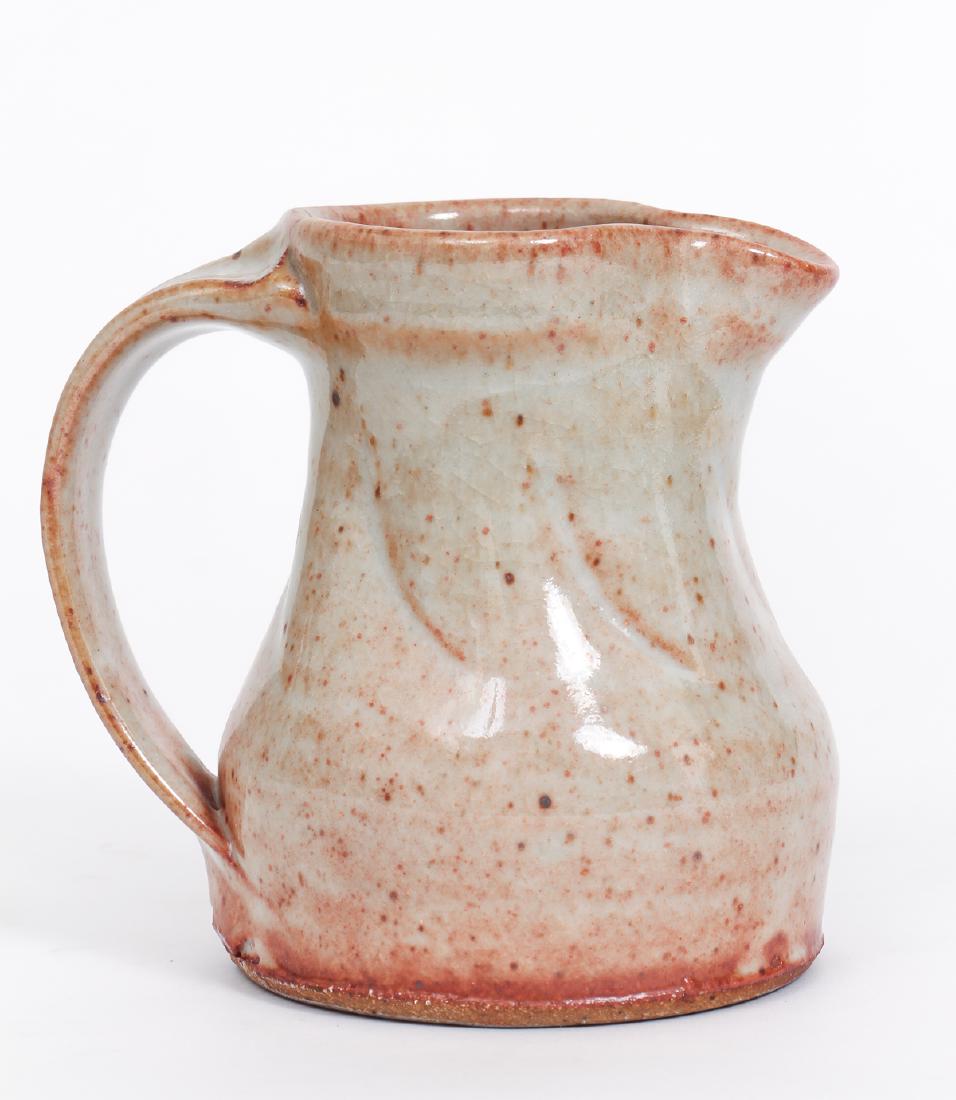 Warren Mackenzie short Pitcher with shino glaze