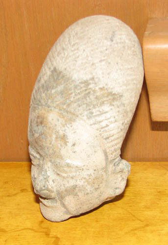 725: small Mayan clay priest head