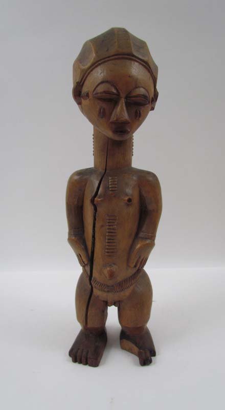 Baule Standing male figure with stylized hair and