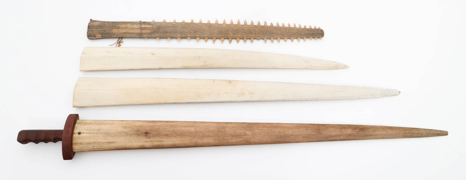 Southeast Asian Sawtooth & Bone Swords Auction