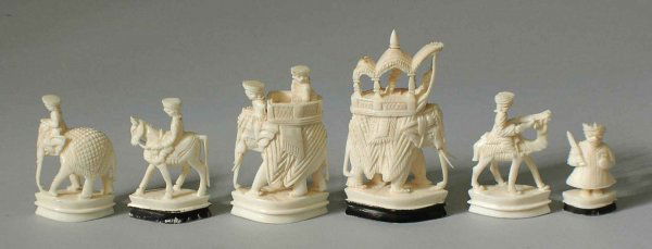 59: INDIAN CARVED IVORY FIGURAL CHESS SET