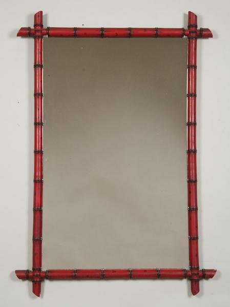 1032: Antique red faux painted bamboo wall mirror