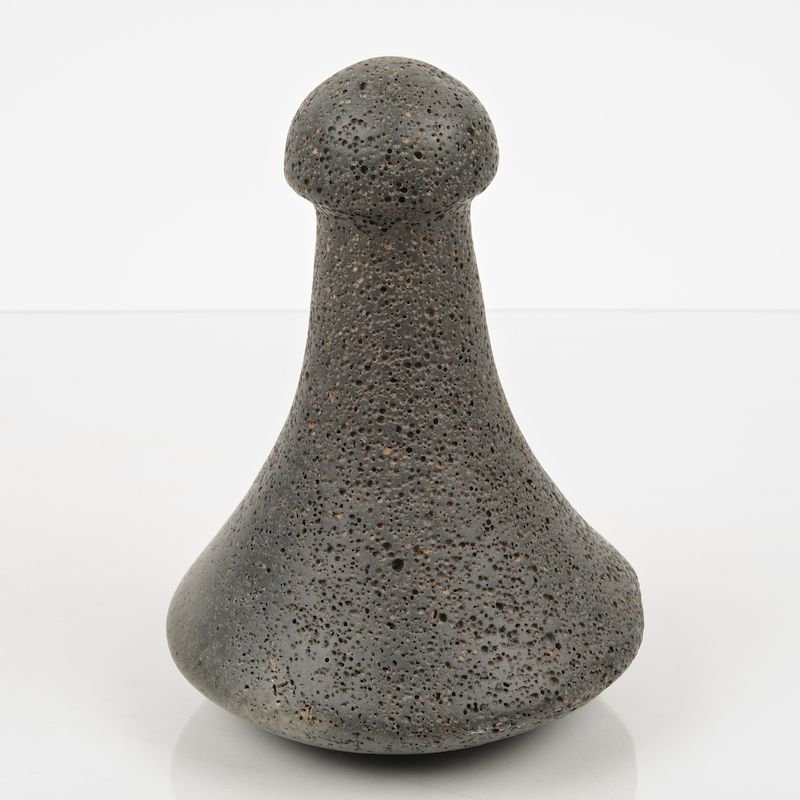 Tribal carved bell shaped stone poi pounder