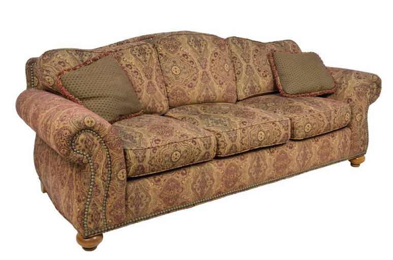 A Custom Camel Back Roll Arm Sofa