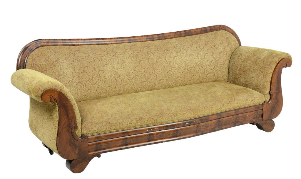 A VICTORIAN SLEIGH SOFA WITH FLAME MAHOGANY FINISH