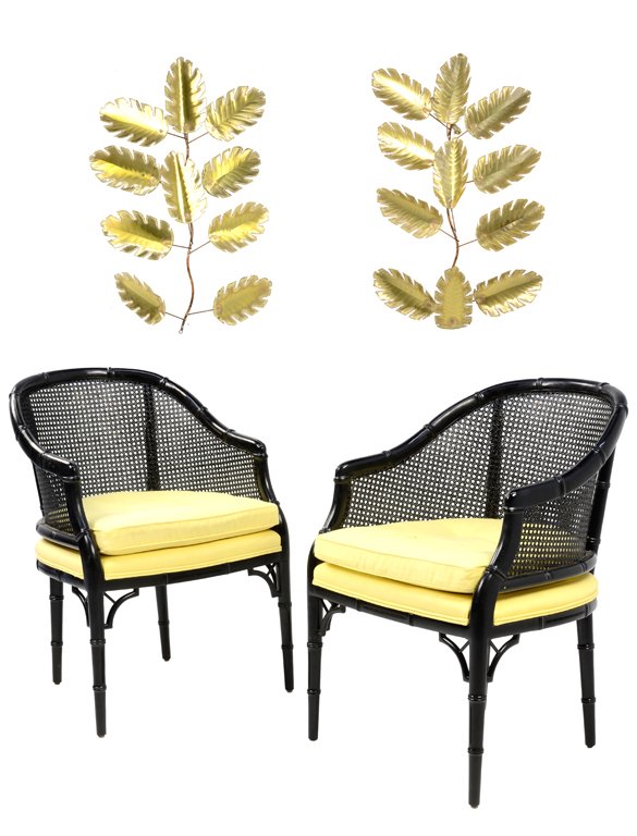A PAIR OF BLACK LACQUER CANE BACK ARM CHAIRS AND BRASS