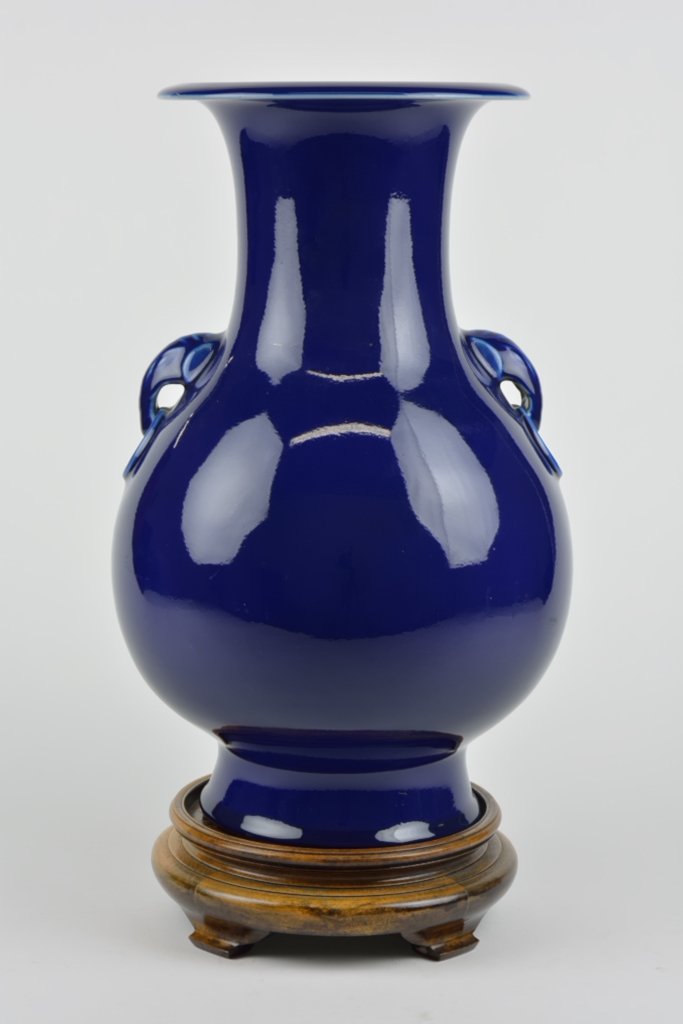 A CHINESE POWDER BLUE MONOCHROME VASE