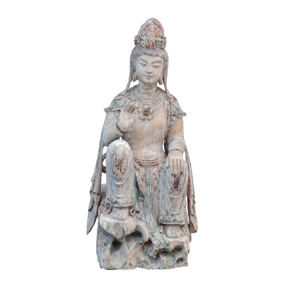 A Statuette Depicting A Seated Quan Yin Auction