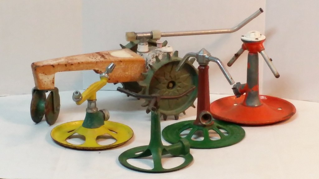 5 Vintage lawn sprinklers with "Cast Iron Crawler"