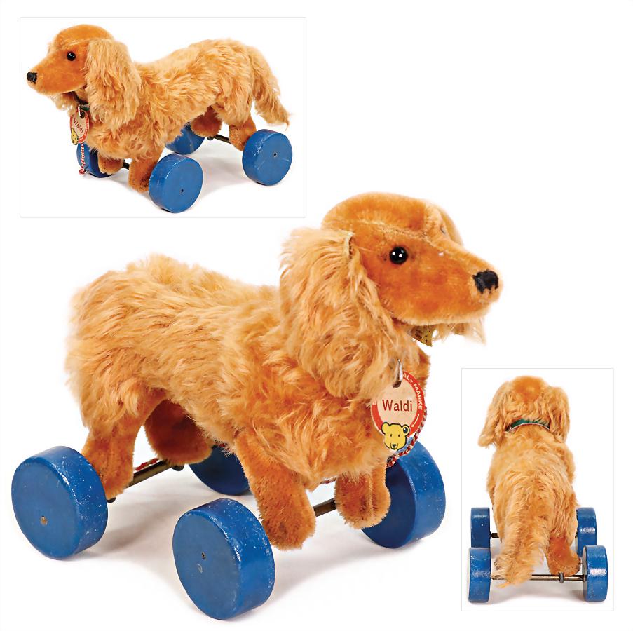STEIFF Waldi, dachshund on wood excenter wheels, produced 1935, with ...
