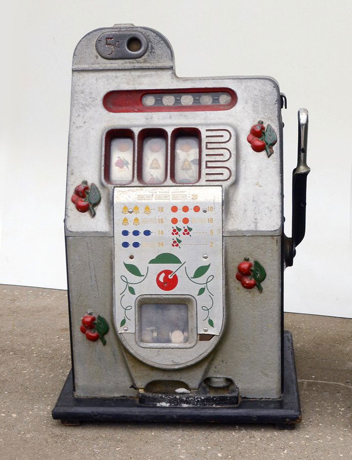 MILLS CHERRY FRONT CAST IRON SLOT MACHINE
