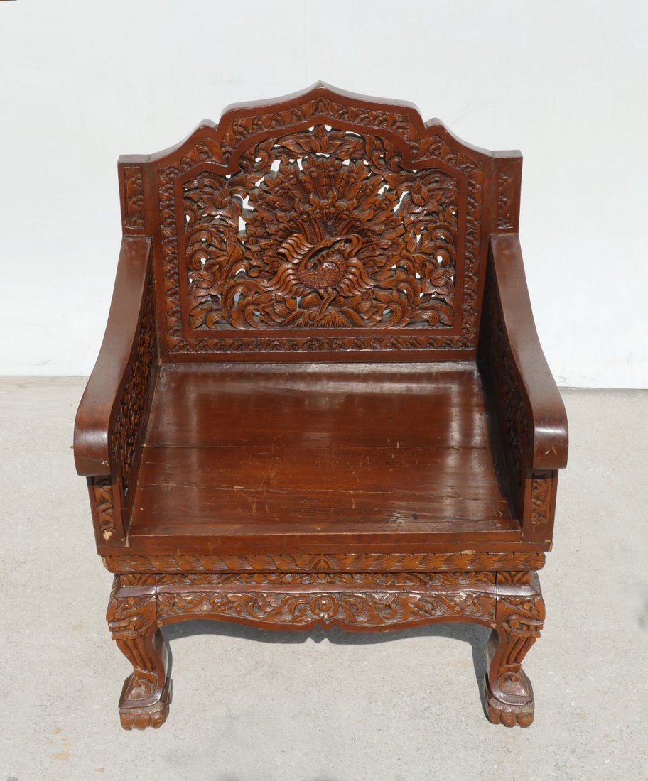 CARVED SOUTH EAST ASIAN ARM CHAIR