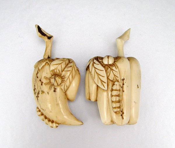 2 Carved Ivory Snuff Bottles