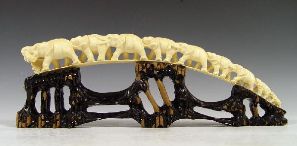 107: CARVED IVORY ELEPHANT BRIDGE TUSK