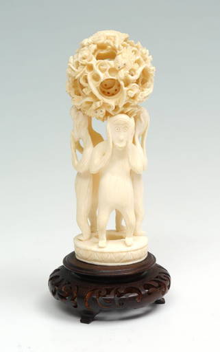 Ivory Mystery Ball On Figural Stand