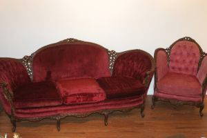 A Victorian Rococo Revival Sofa And Armchair, Leng
