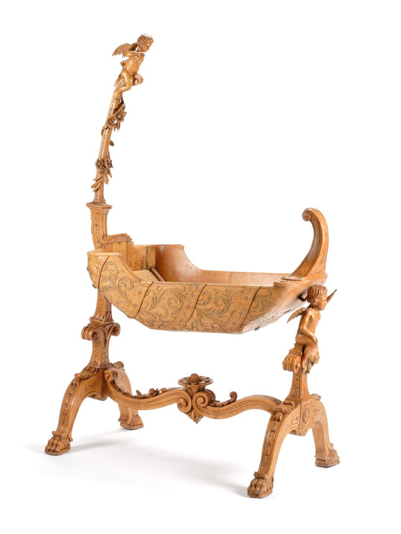 An Italian Carved Cradle Height 66 1/2 x length 41 x