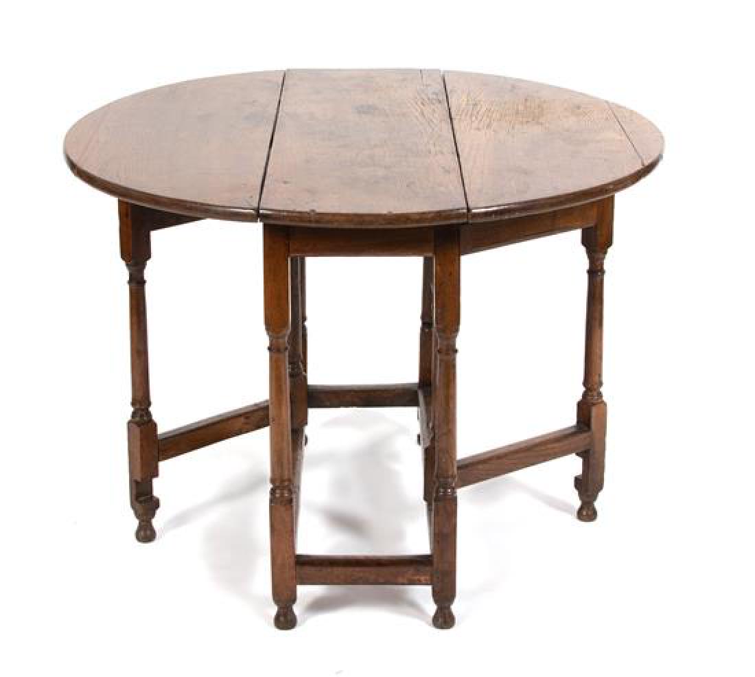 An English Jacobean Style Oak Gate Leg Table - Apr 25, 2019 | Hindman in IL