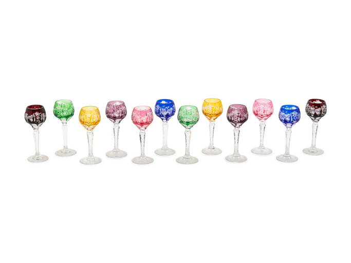 A Set Of Twelve Bohemian Cut To Clear Colored Glass