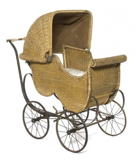 A Victorian Caned Carriage, Height Overall 45 Inches.