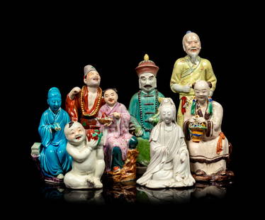 Eight Chinese Porcelain Lohan Figures