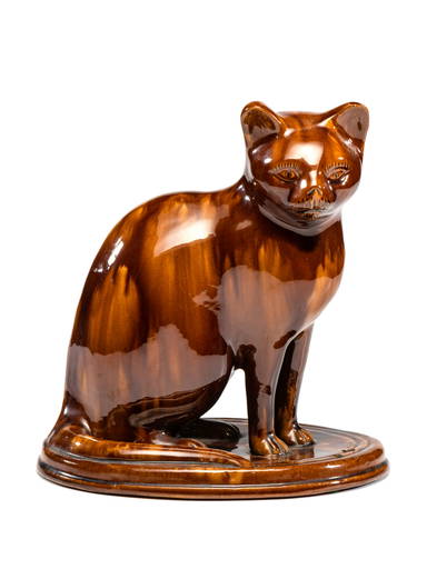 A Rare Rockingham Glazed Yellowware Seated Cat