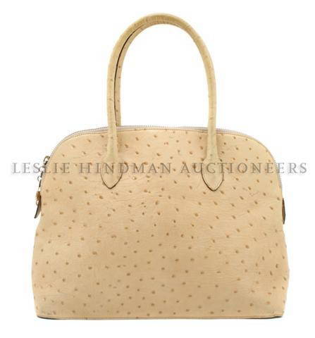 An Escada Cream Ostrich Bolide Style Bag. 15 X 8 I