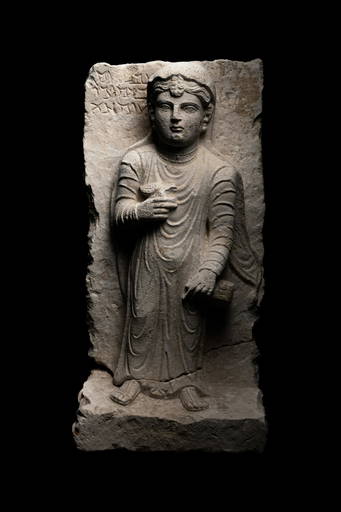 A Palmyran Limestone Relief of a Woman Height 19 7/8 inches (50.5 cm ...