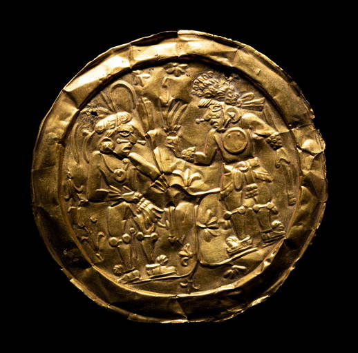 An Aztec or Toltec Gold Embossed Disc Diameter 3 3/16 inches (8.3 cm ...