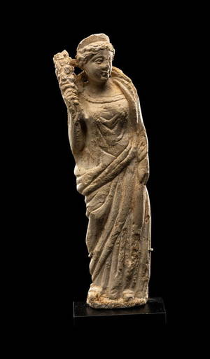 A Roman Stucco Figure Of Fortuna