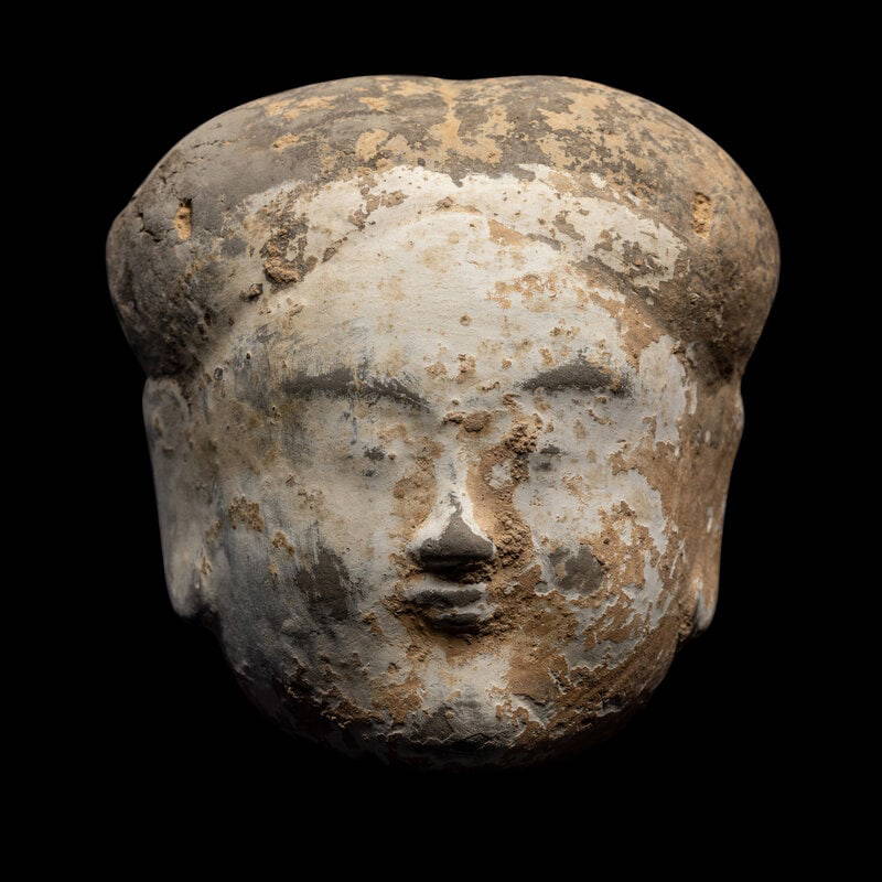 A Chinese Pottery Head Of An Attendant Auction