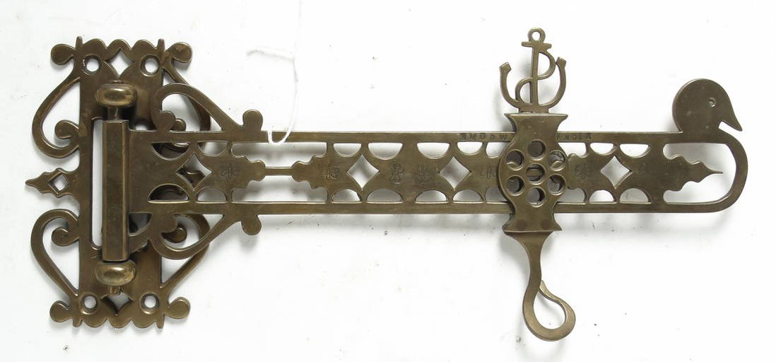 A Richard Newcome Brass Tool, Length 15 1/4 Inches.