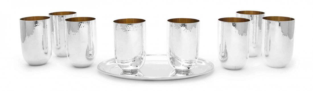 A Set Of Eight Italian Silver Beakers And Small Tray,