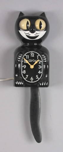Mancow: A Kit Cat Wall Clock,