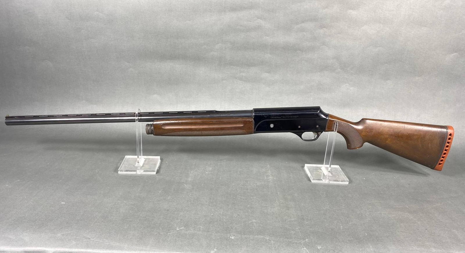 Universal Auto-wing 12 Gauge Shotgun. Auction