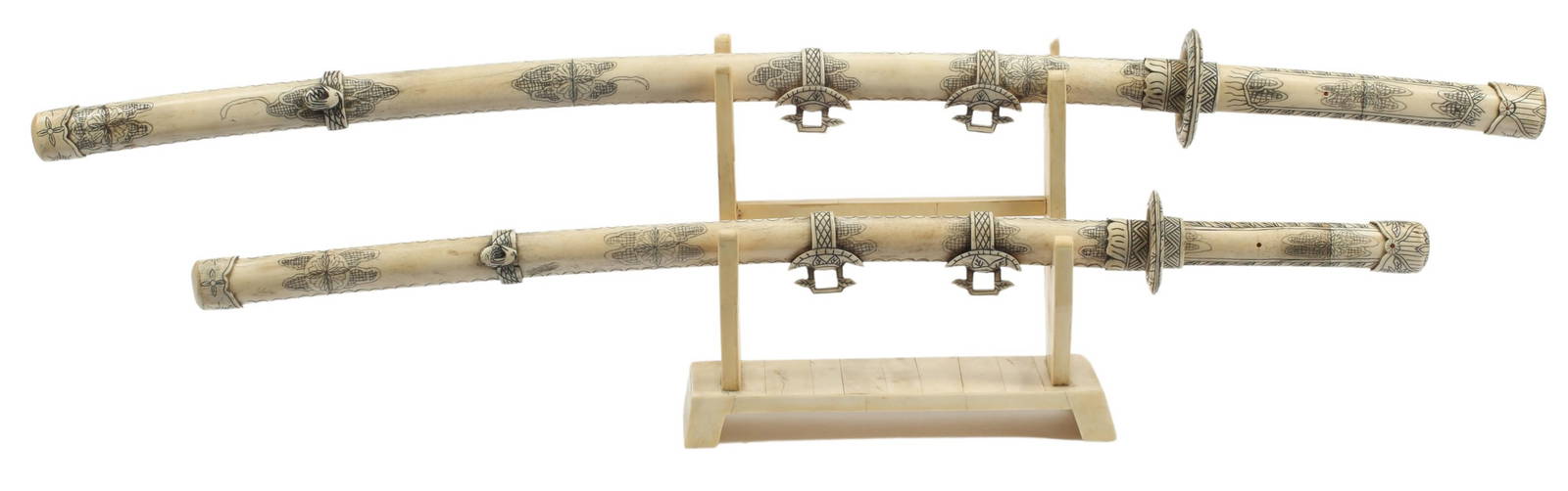 (2) Japanese Carved Bone Swords On Stand Auction