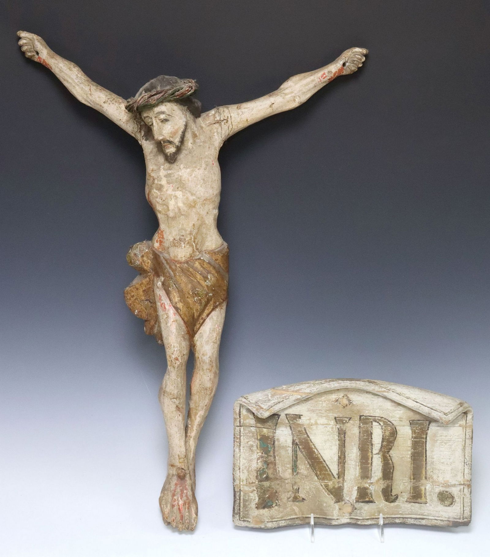 (2) Carved Wood Religious Items, Corpus Christi Santo & Inri Scroll Auction