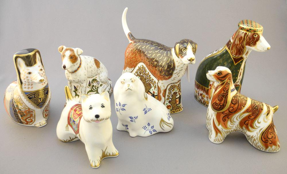 7 Royal Crown Derby Dog Paperweights.