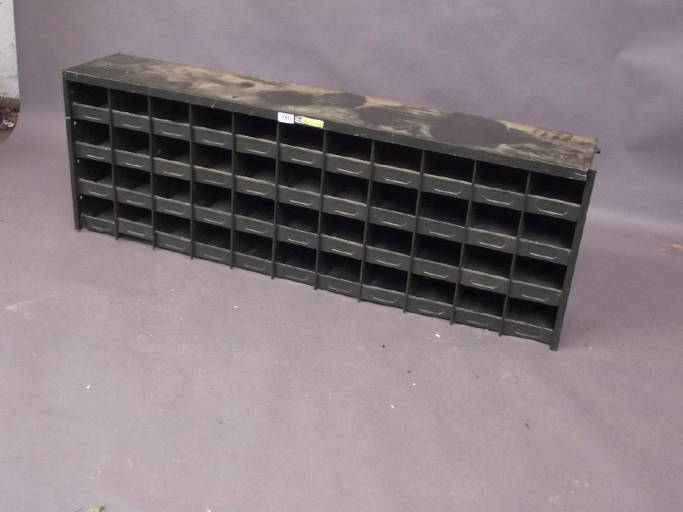 An Enamelled Steel Pigeon Hole Rack, 17" X 9" X 50"