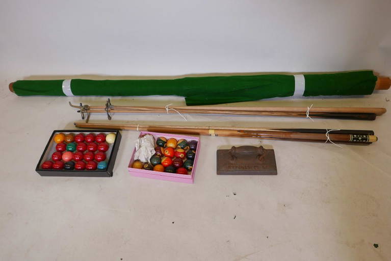 A Quantity Of Snooker Cues And Rests Together With Sets