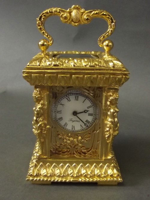 An ornate brass carriage clock with 'Trigona' movement, - Jul 11, 2013 ...