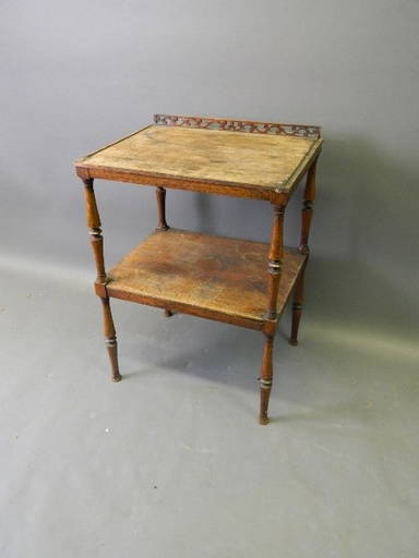 A 2 Tier Oak Veneered Whatnot Table On Turned Supports,