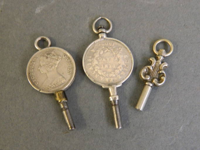 Three Silver Watch Keys, Two Set With Coins To End,