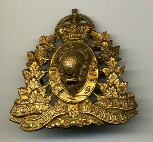 1276: VINTAGE RCMP HAT BADGE