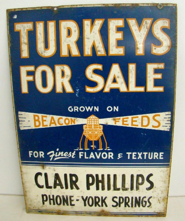 2309: TWO-SIDED BEACON FEEDS TIN ADVERTISING SIGN