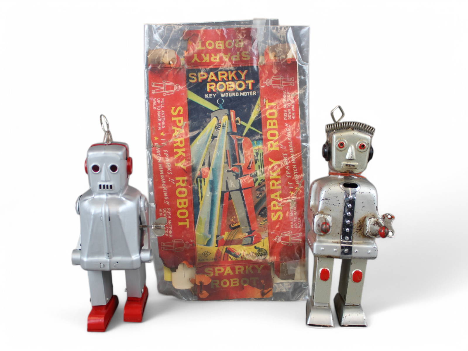 Lot Of (2) Tin Wind Up Robots Auction