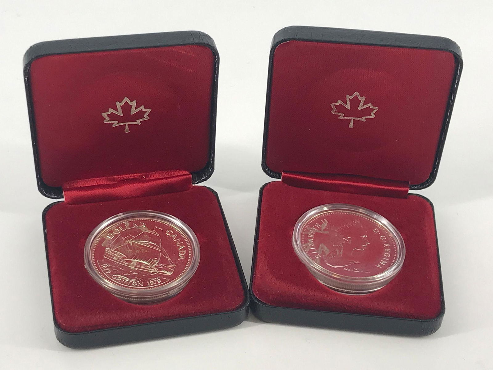 Two Canadian Silver Dollar Coins