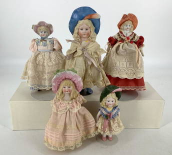 Four German Bonnet Head Dolls.