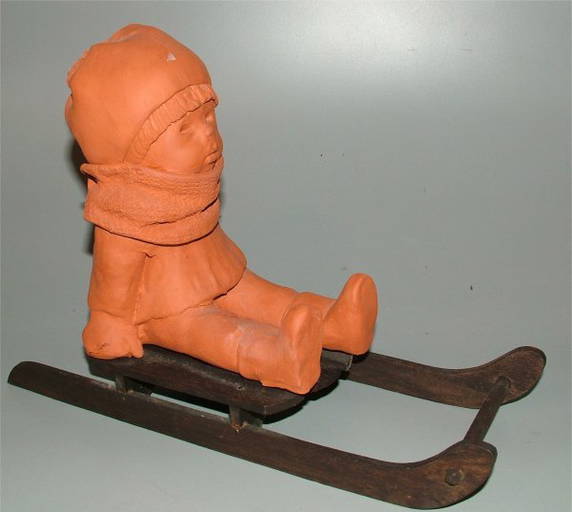 Ann Entis Terra Cotta Sculpture, Boy On Sled 8 1/